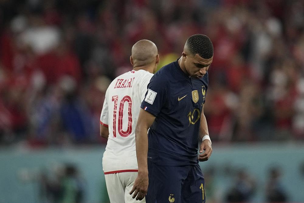 France loses to Tunisia 1-0 but still wins World Cup group