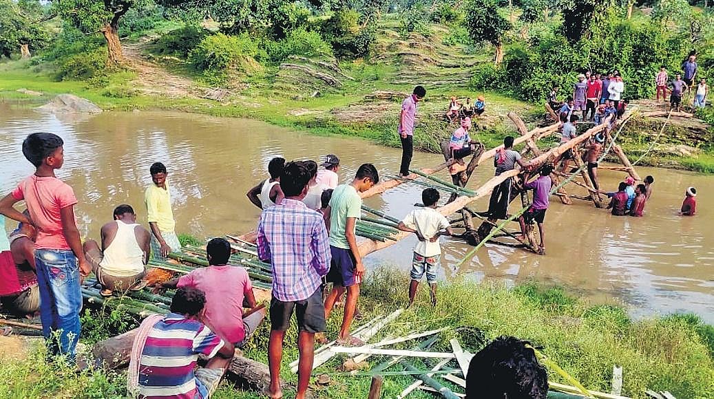 Jharkhand villagers cross the bridge, literally