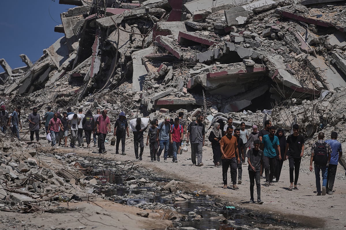 Officials say 85 Palestinians seeking aid are killed in Gaza as Israel ...
