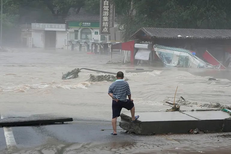 Death toll reaches 22 in China rains, 20 more missing