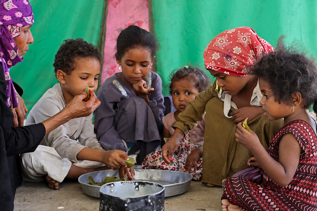 Yemen's displaced family survive on boiled tree leaves as aid cuts ...