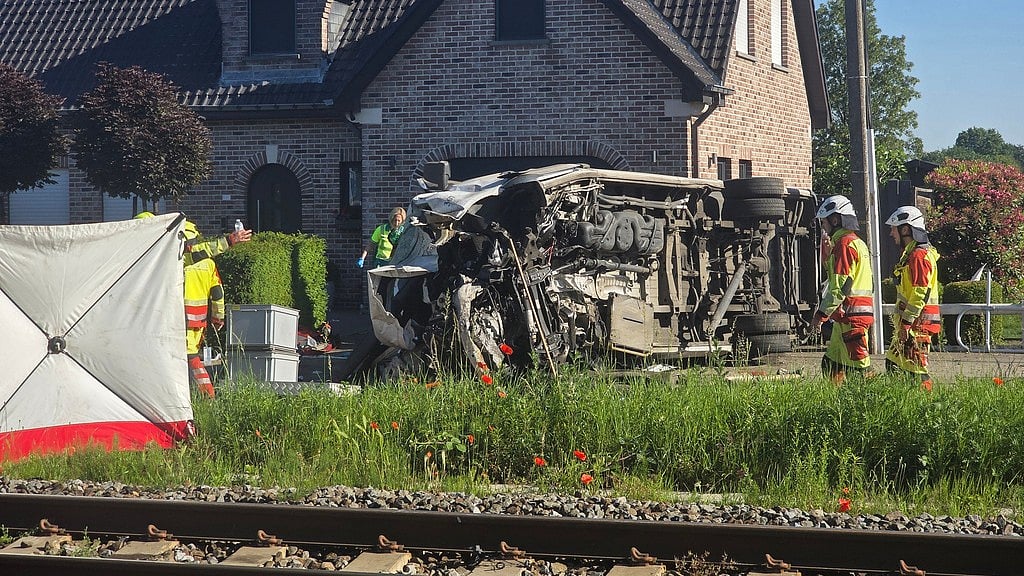 Four dead, five injured in a crash between a train and a school bus in ...