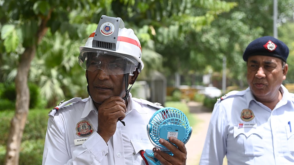 Delhi traffic cops get AC in helmets, fans, ORS packets to fight heat