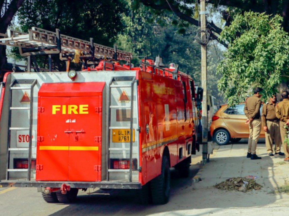 Two firefighters injured in fire at five-storey office building in ...