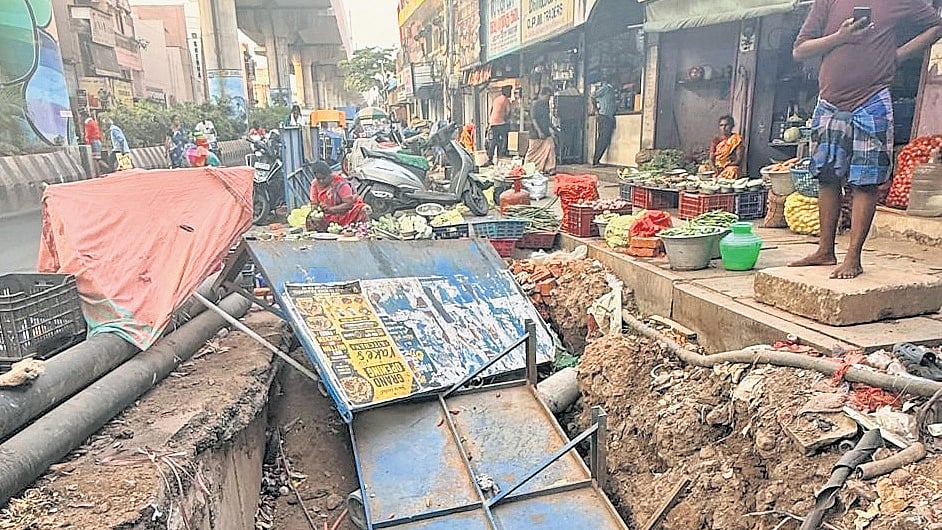 Broken pathways and open pits greet commuters on TH Road