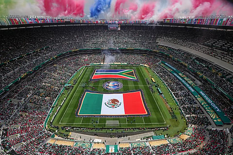 Pre-match unrest erupts at Azteca as protesters hurl petrol bombs and ...