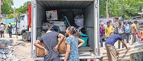 Slum clusters near PM residence razed
