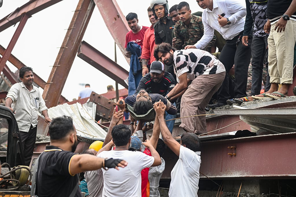 Three dead, 18 rescued after under-construction warehouse collapses in ...