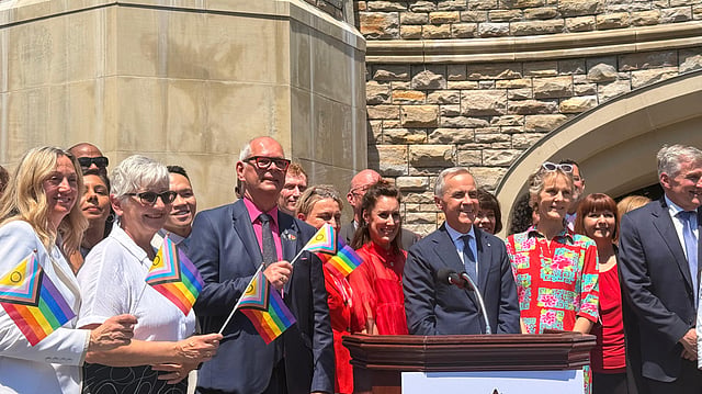 Carney raises pride flag as government announces $3 million for sexual ...